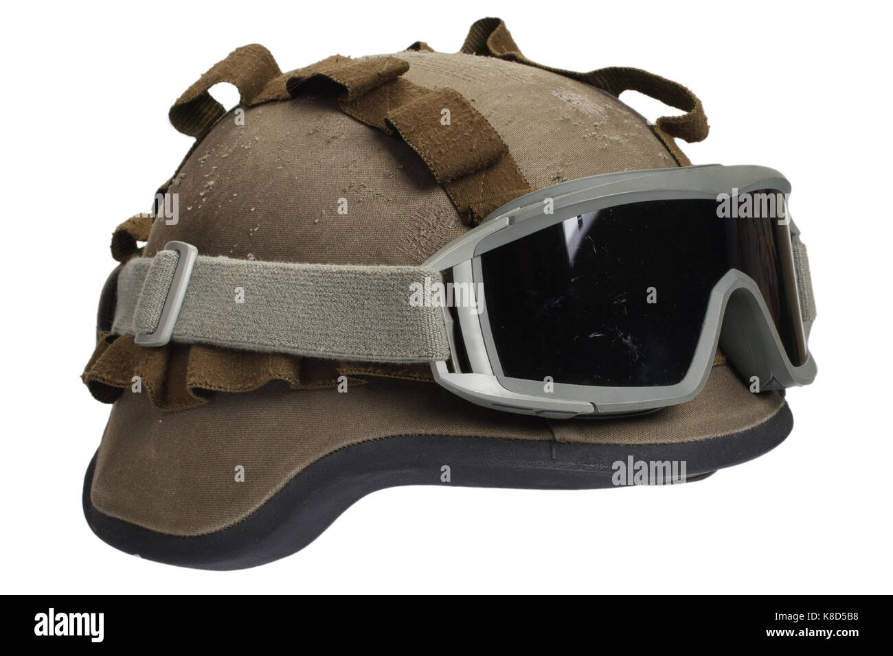 kevlar helmet with camouflage cover and protective goggles Stock Photo ...