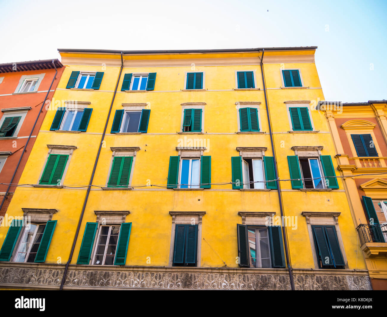 Beautiful Italian style buildings in the historic district of Pisa ...