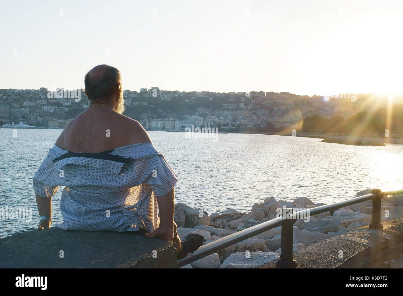 men taking sun, in Naples, Italy Stock Photo - Alamy