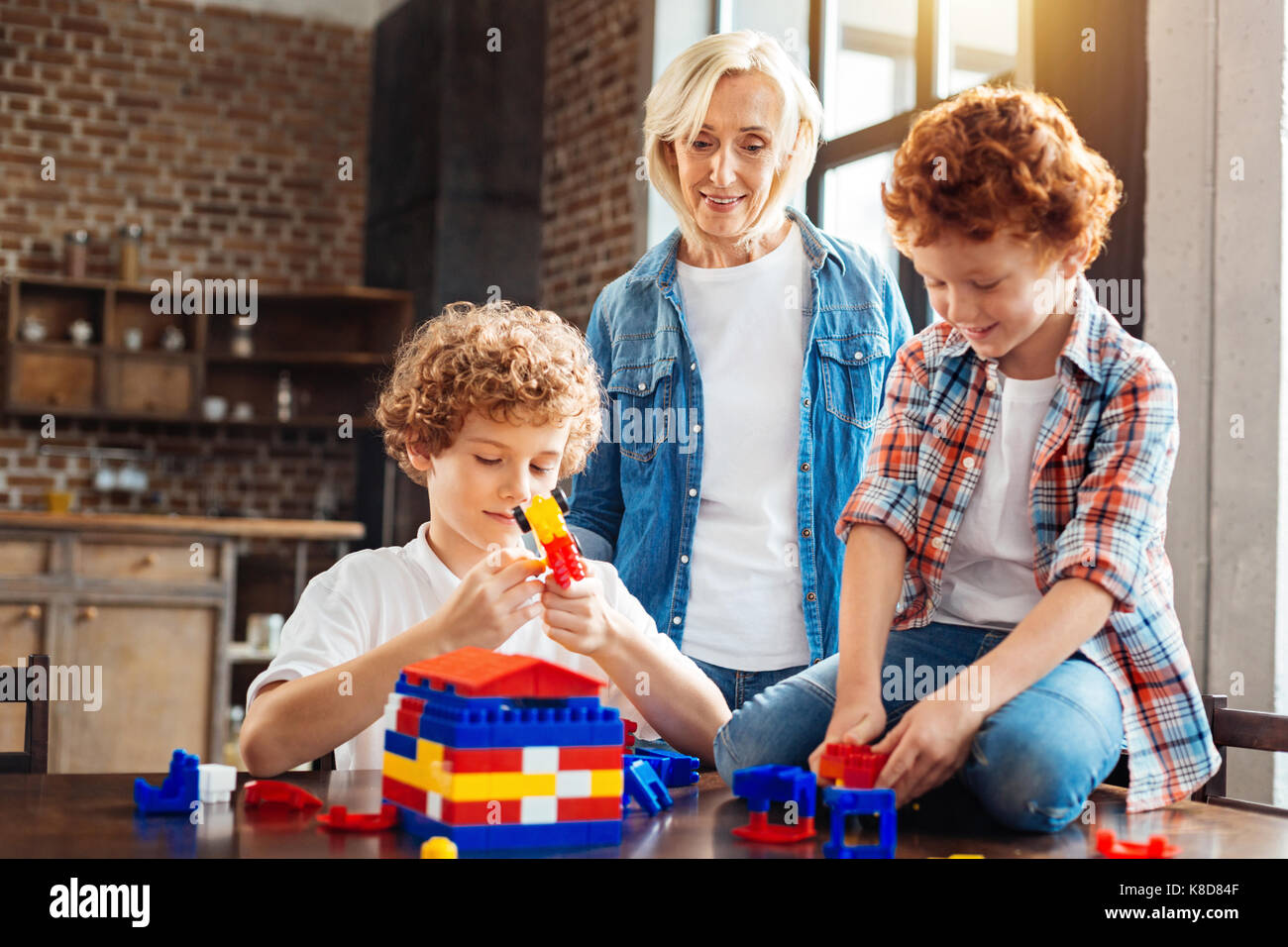 Elderly and children playing hi-res stock photography and images - Alamy