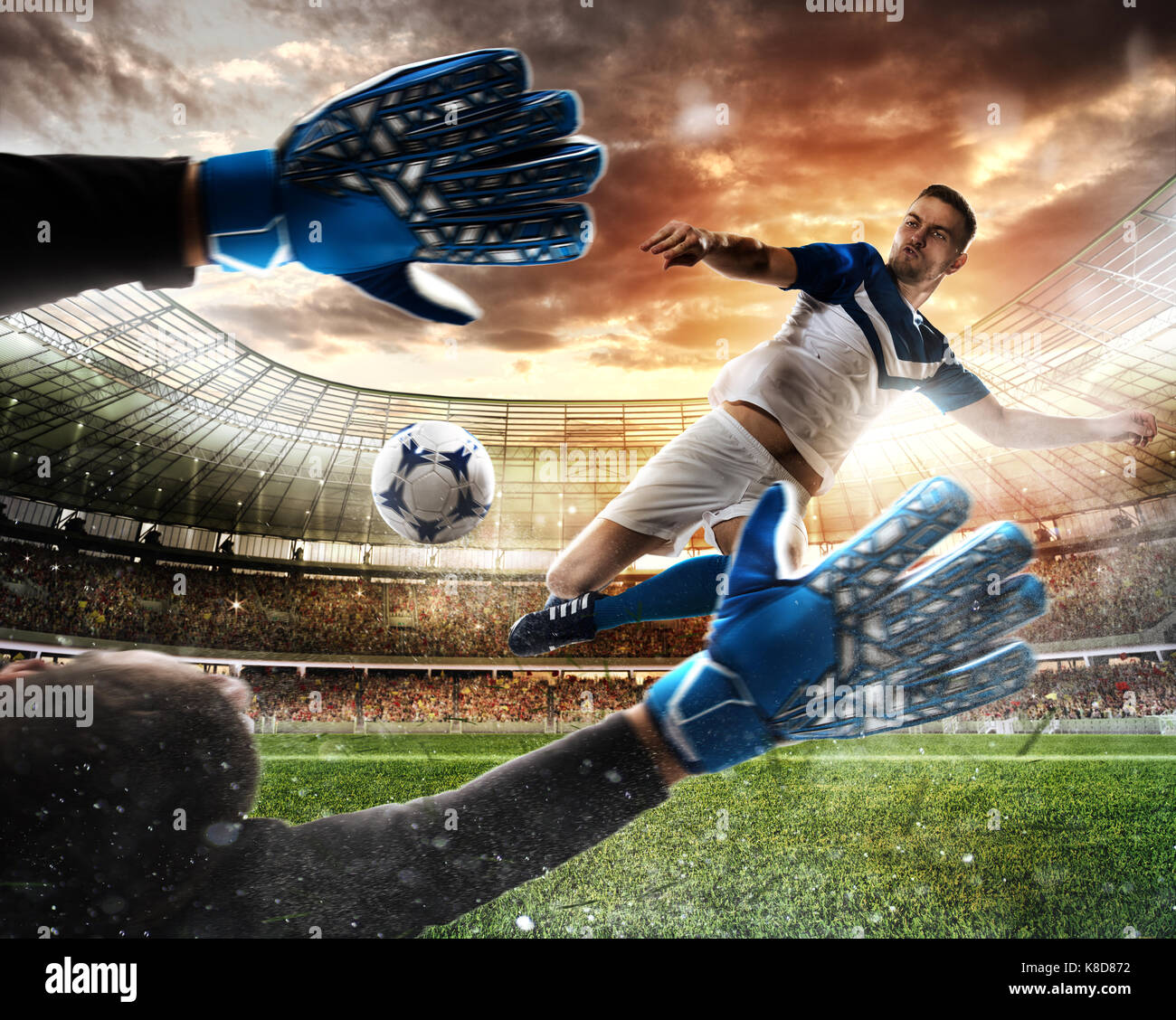 Goalkeeper catches the ball in the stadium Stock Photo - Alamy