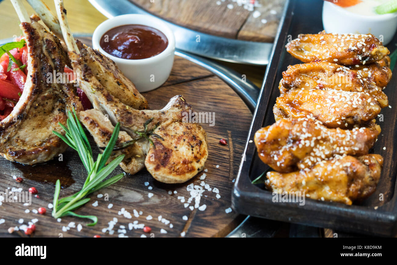 Fried barbecue and baked meat food Stock Photo - Alamy