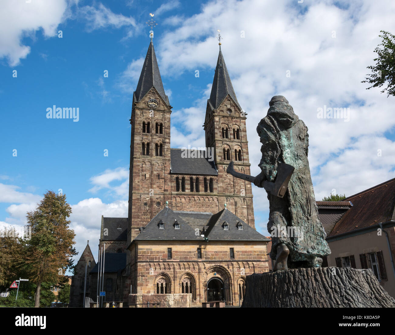The cathedral of the small German town Fritzlar with the statue of ...
