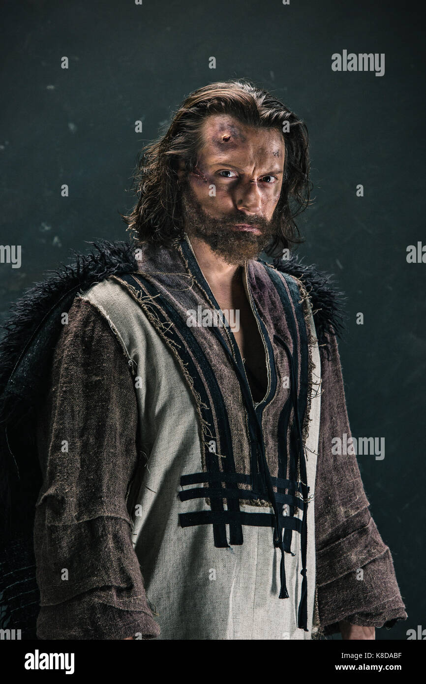 Actor in makeup, a poor man in a suit Stock Photo - Alamy