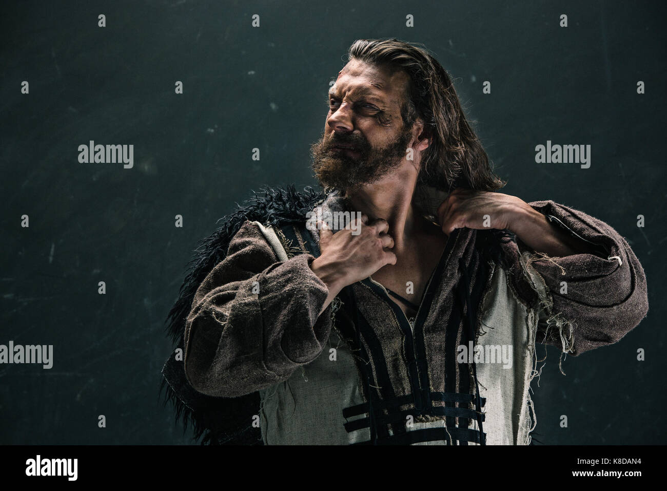 Actor in makeup, a poor man Stock Photo - Alamy