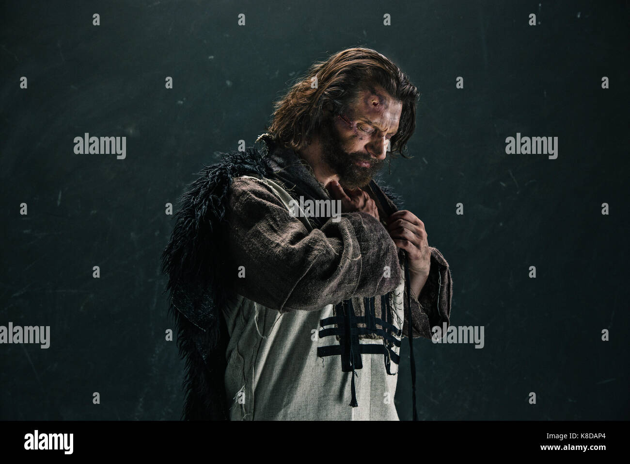 Actor in makeup, a poor man Stock Photo - Alamy