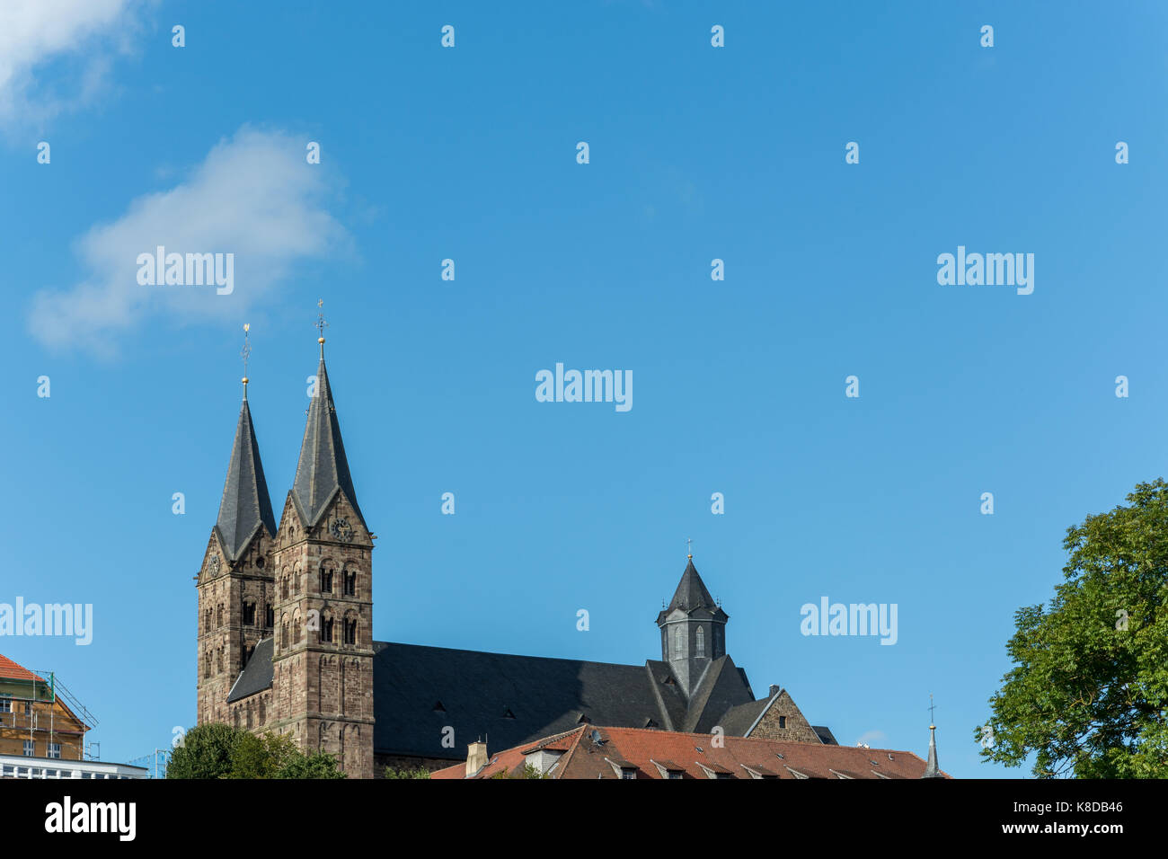 The cathedral of the small German town Fritzlar with blue sky Stock ...