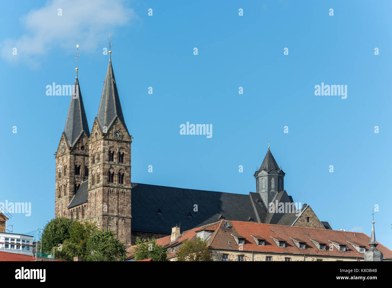 The cathedral of the small German town Fritzlar with blue sky Stock ...