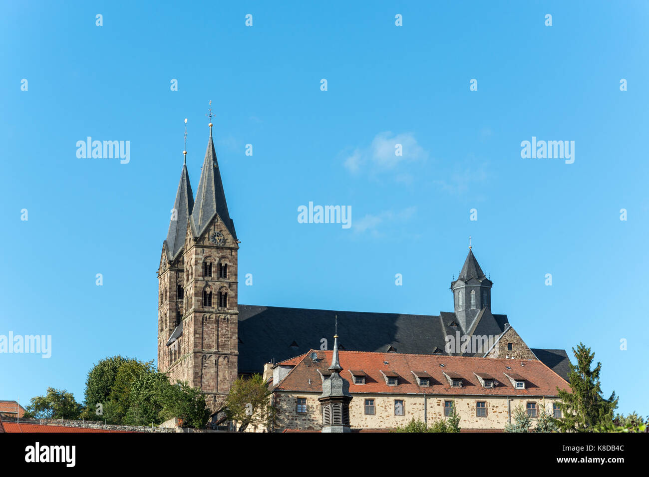 The cathedral of the small German town Fritzlar with blue sky Stock ...