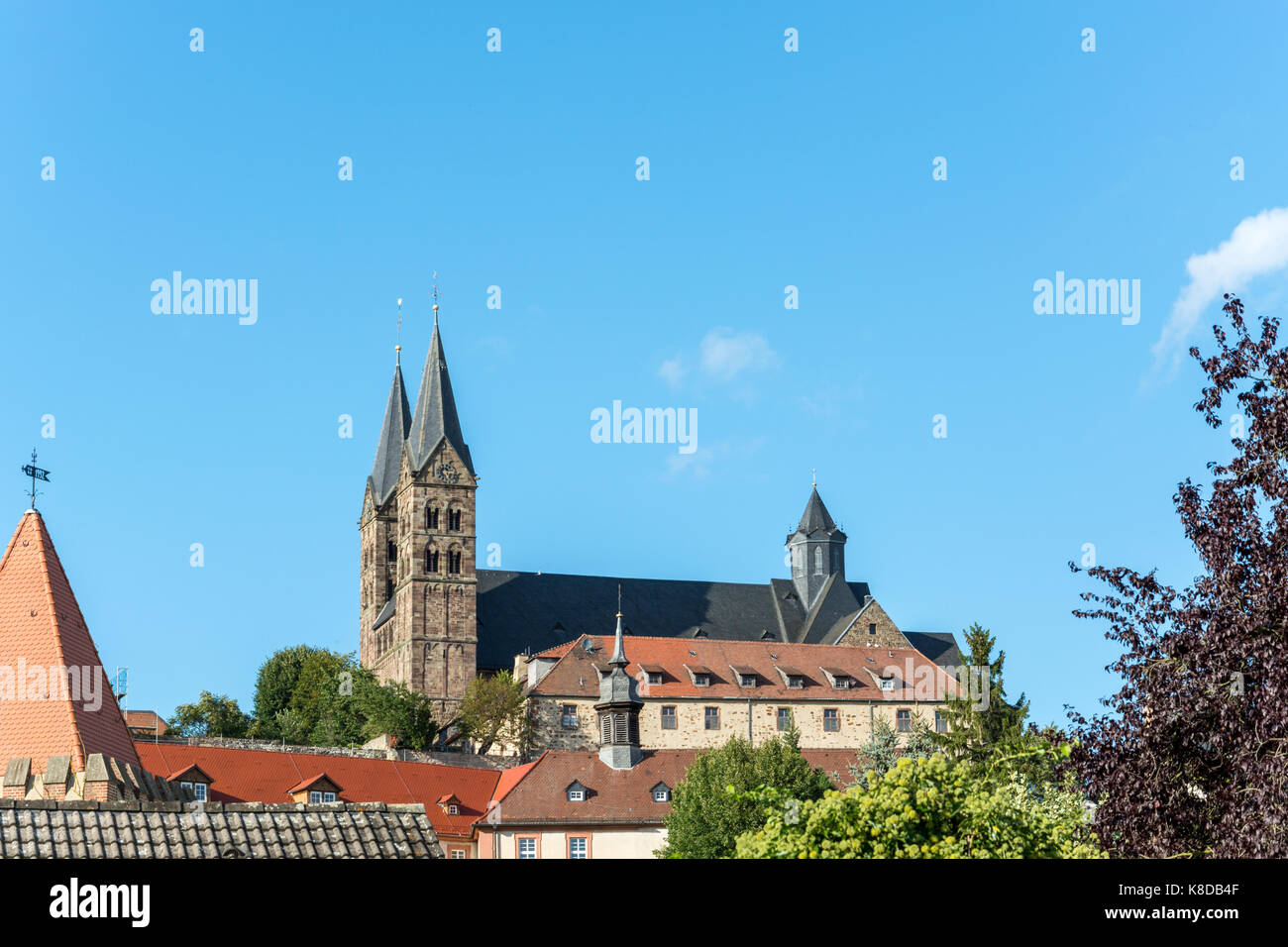 The cathedral of the small German town Fritzlar with blue sky Stock ...