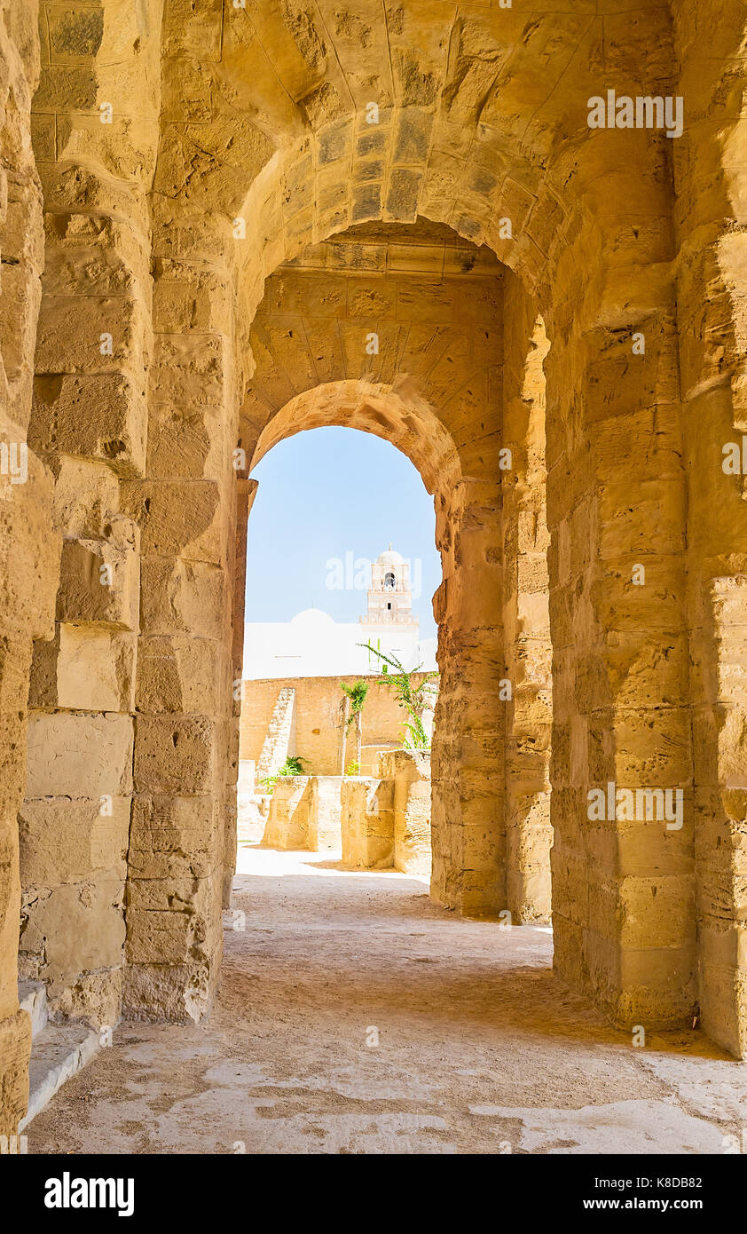 EL DJEM, TUNISIA - SEPTEMBER 1, 2015: The view on white mosque through ...