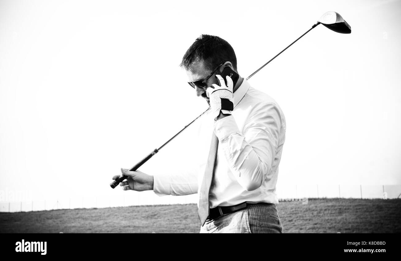 Young man on golf Black and White Stock Photos & Images - Alamy