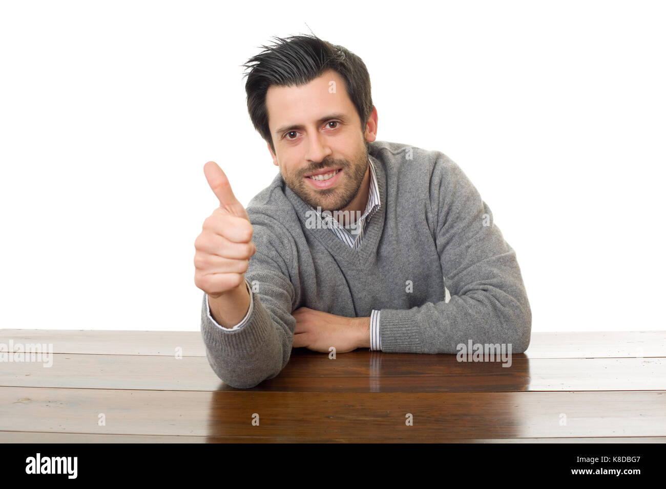 happy man going thumb up, on a desk, isolated Stock Photo - Alamy