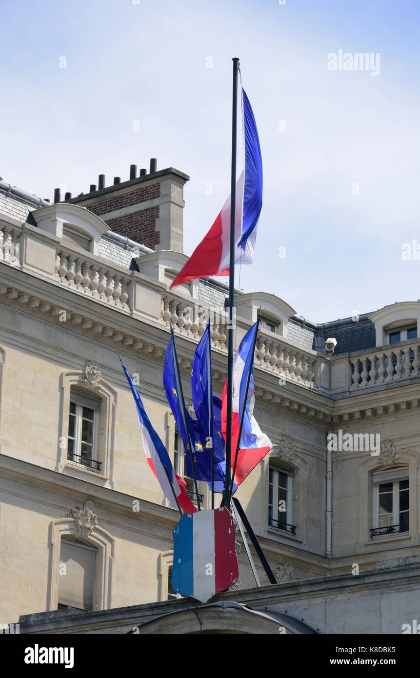 French flags at front o governmentf building Stock Photo - Alamy