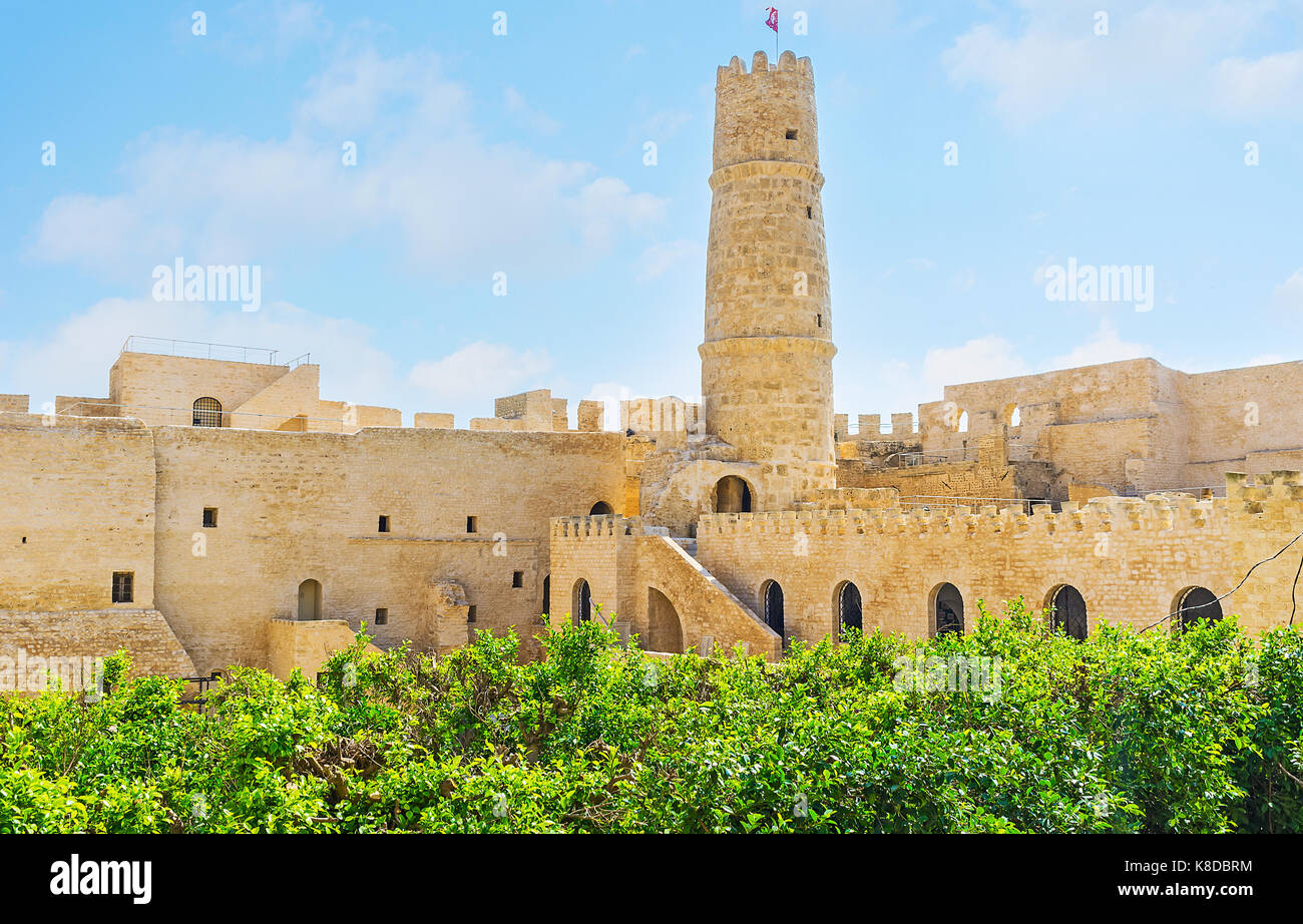 The lush green garden at the walls of the medieval Ribat fortress ...