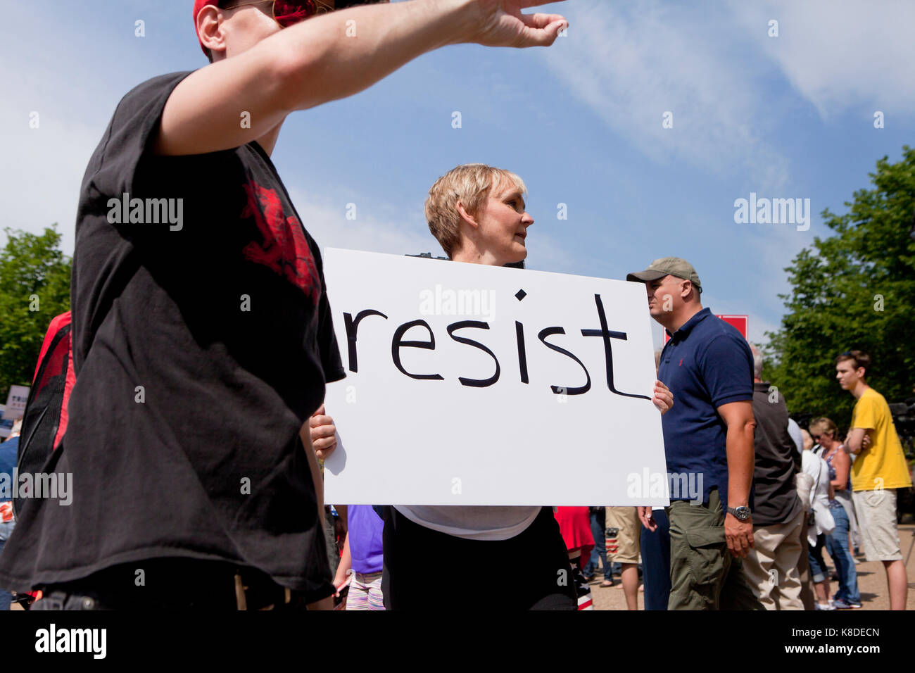 Woman holding trump sign hi-res stock photography and images - Alamy