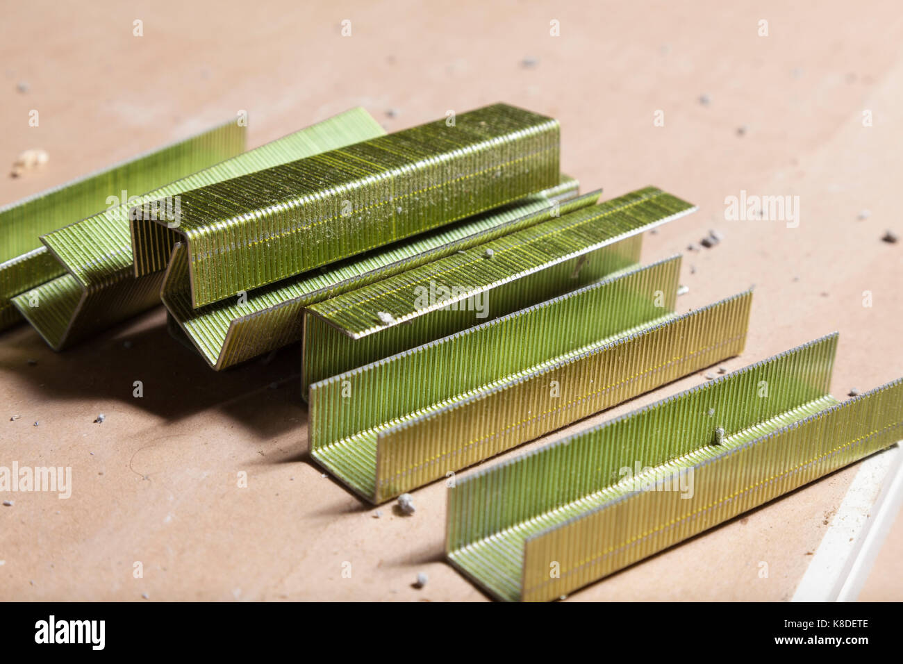 A pile of staple strips used for a staple gun Stock Photo - Alamy