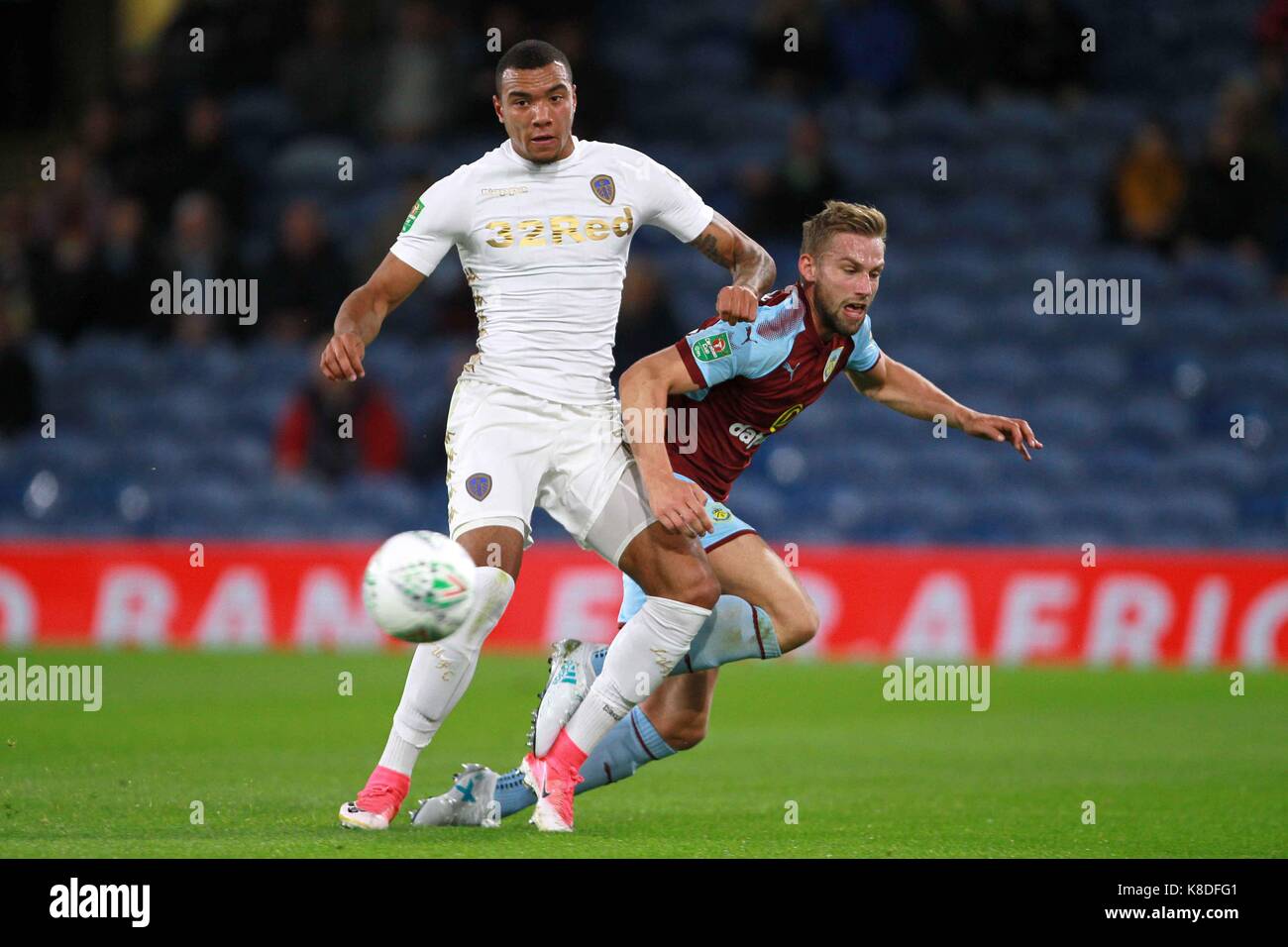 Leeds United's Jay-Roy Grot (left) and Burnley's Charlie Taylor battle ...