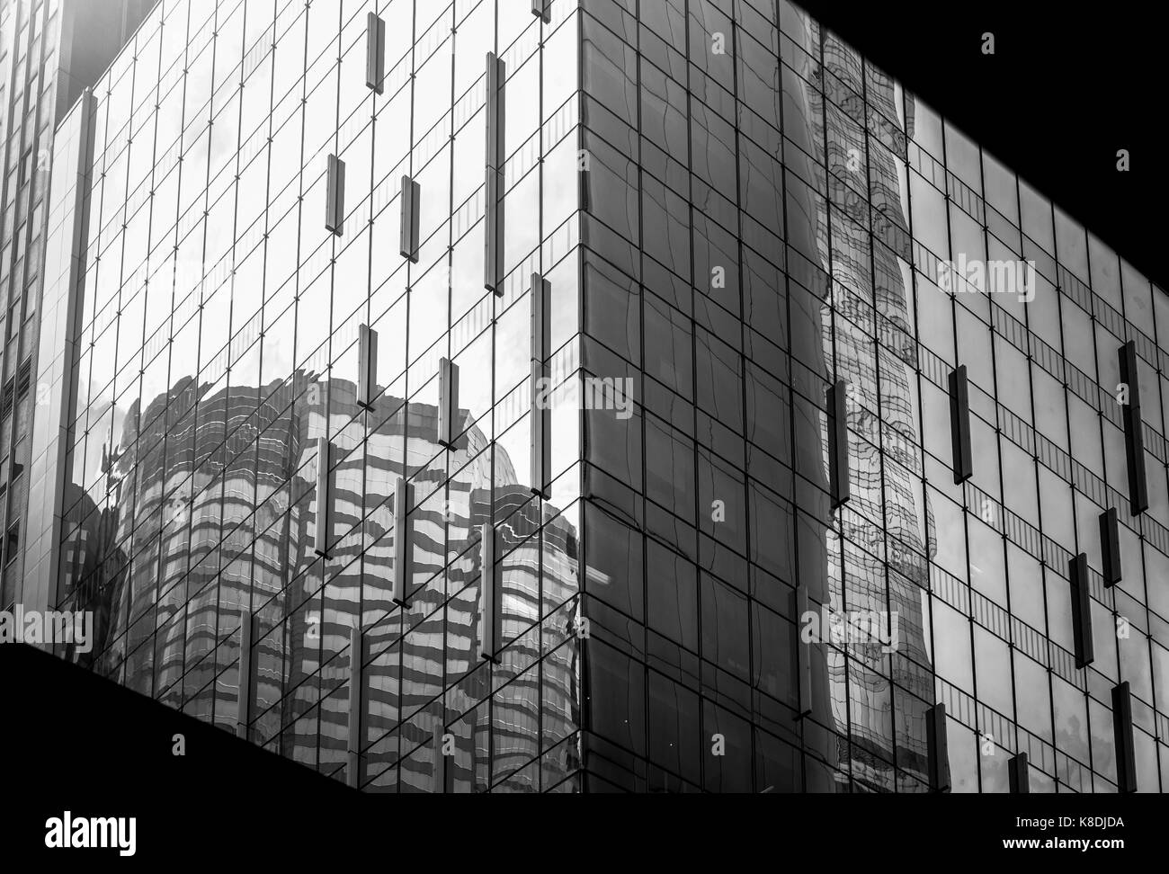 windows of commercial building in Hong Kong with B&W color Stock Photo ...