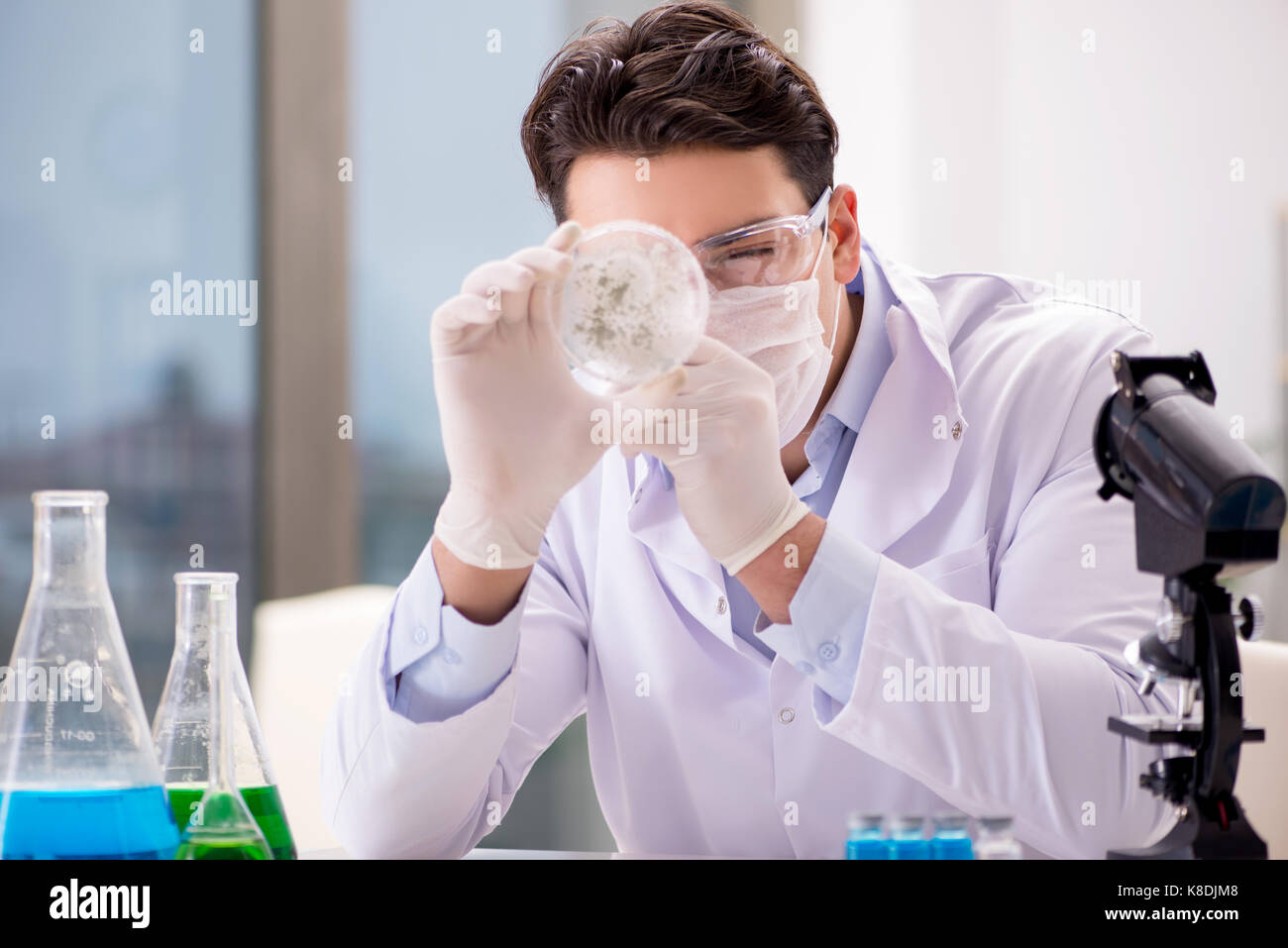 Male doctor working in the lab on virus vaccine Stock Photo - Alamy