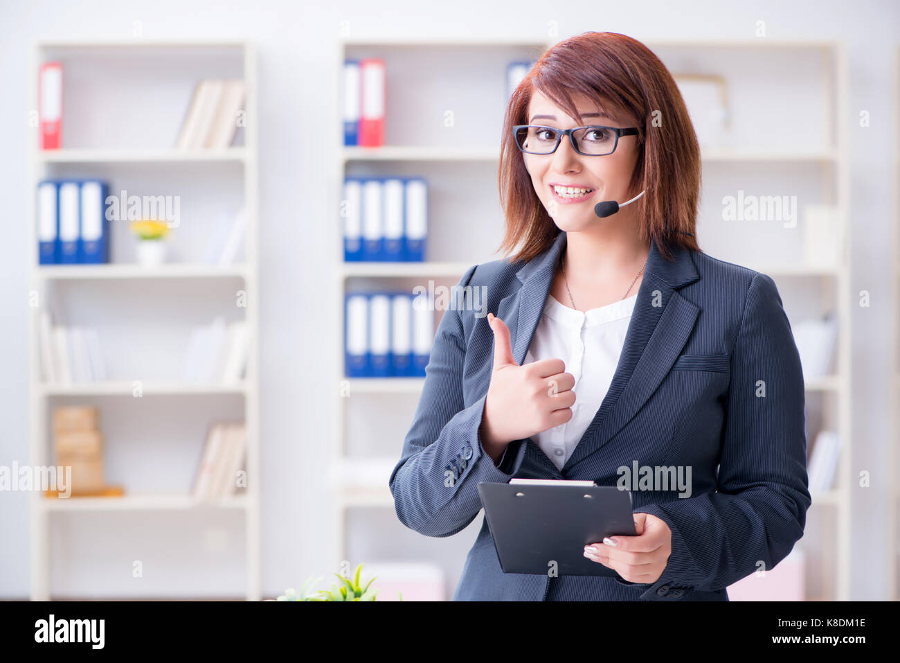 Call center operator working with clients Stock Photo - Alamy