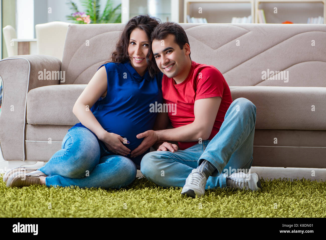 Young couple family expecting a baby Stock Photo - Alamy
