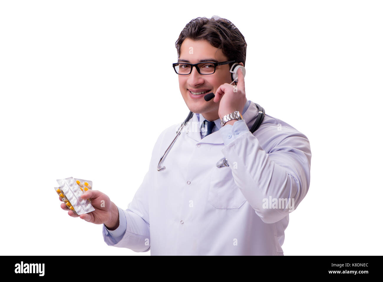 Young doctor with phone headset isolated on white Stock Photo - Alamy