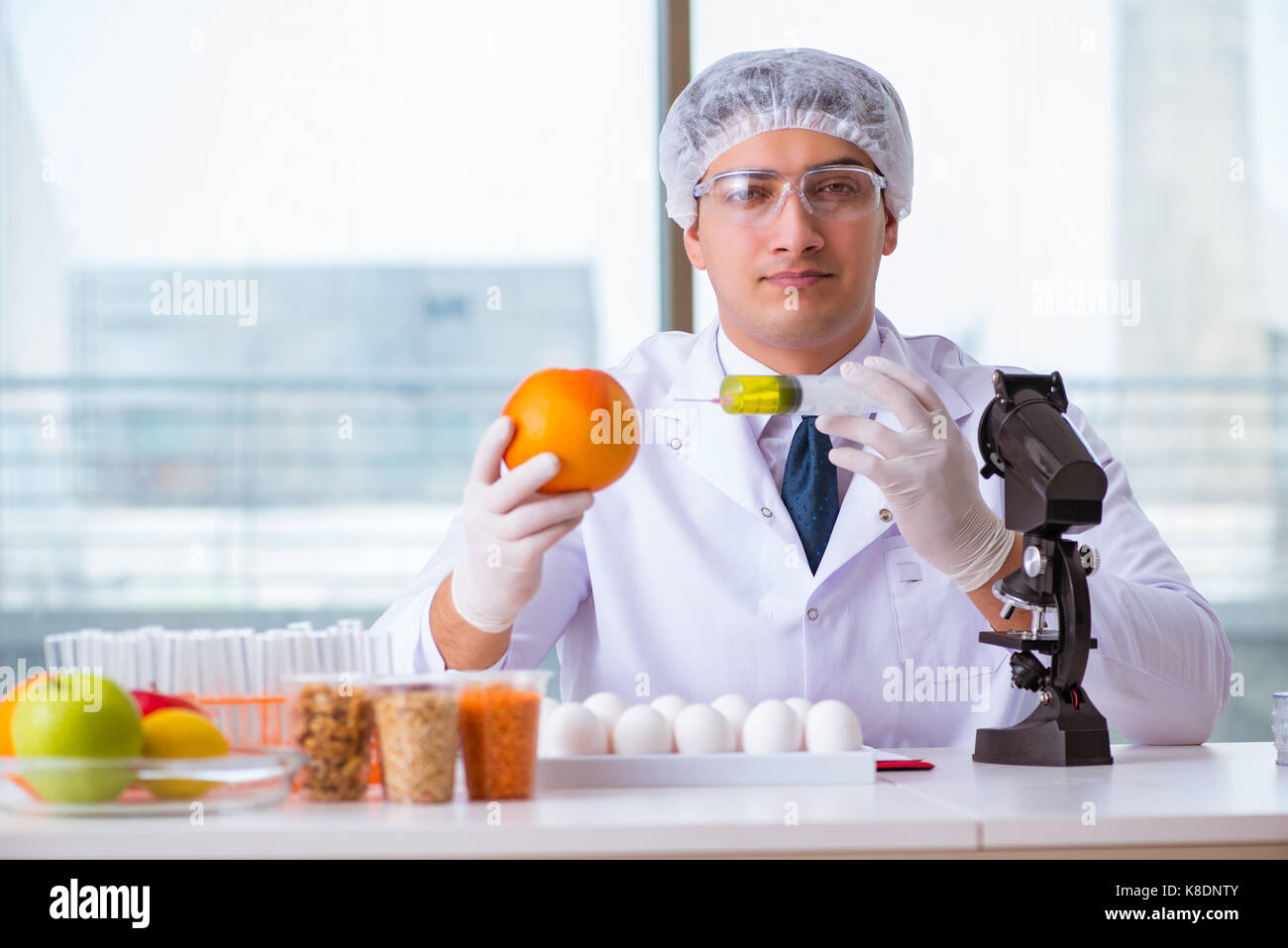 Nutrition expert testing food products in lab Stock Photo - Alamy