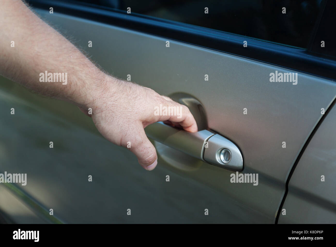 man's hand opens the car door Stock Photo - Alamy