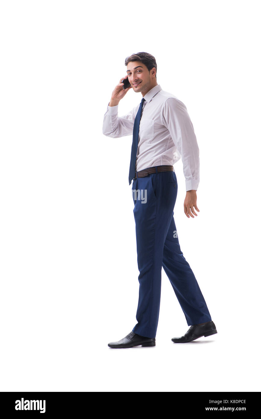 Businessman walking standing side view isolated on white background ...