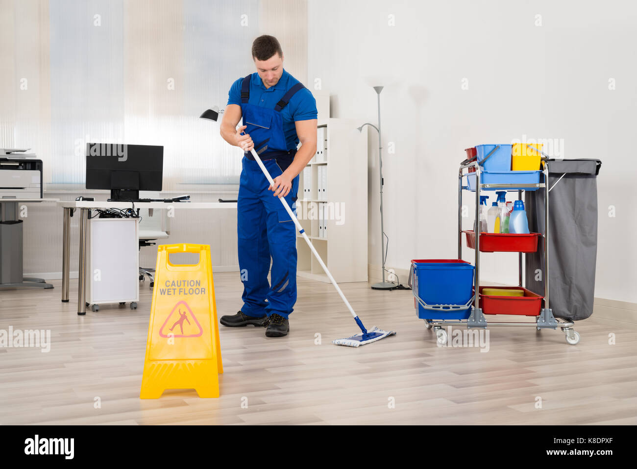 Janitor Mopping Floor
