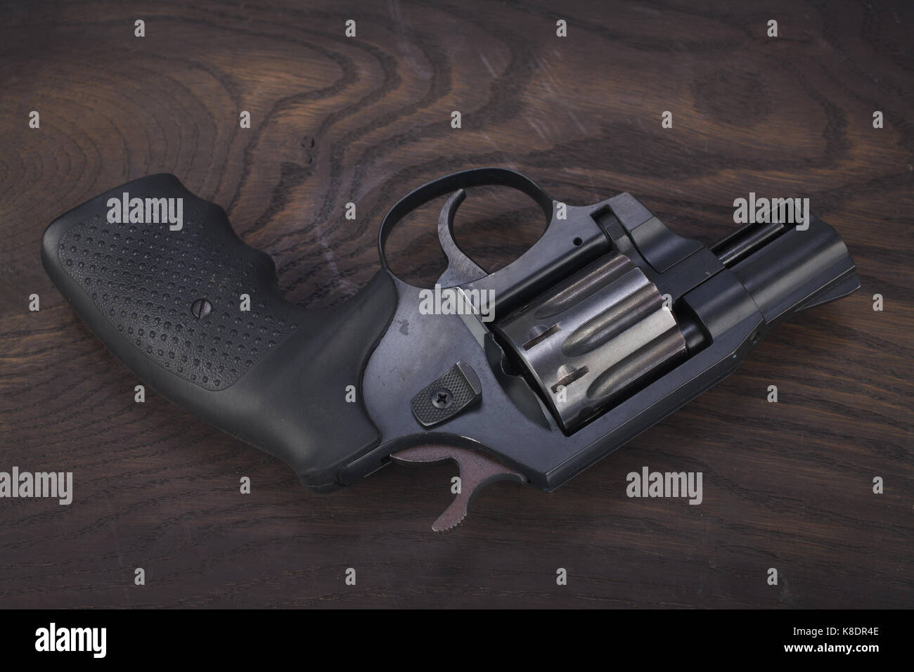 Revolver gun with wooden handle hi-res stock photography and images - Alamy