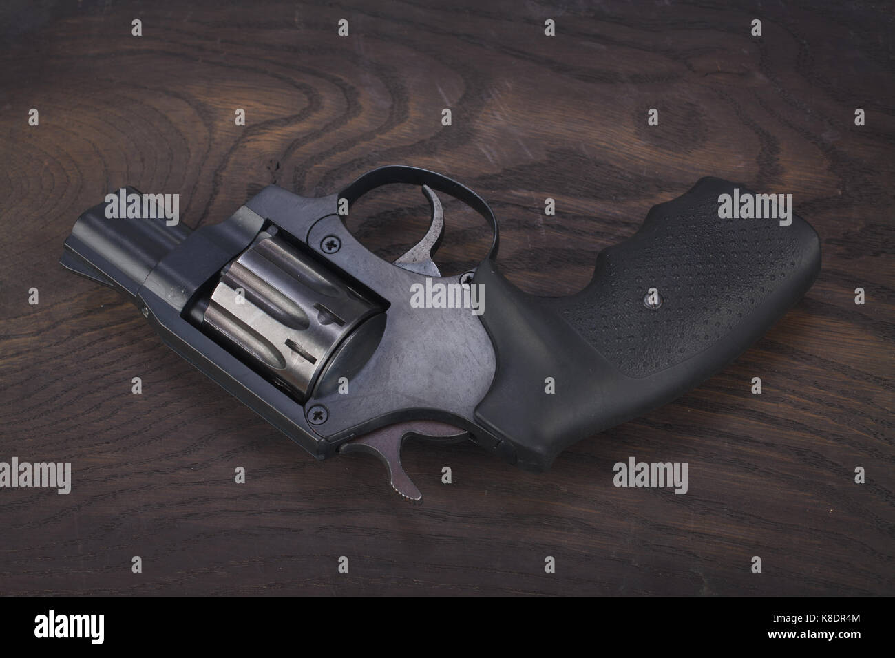 Revolver gun with wooden handle hi-res stock photography and images - Alamy