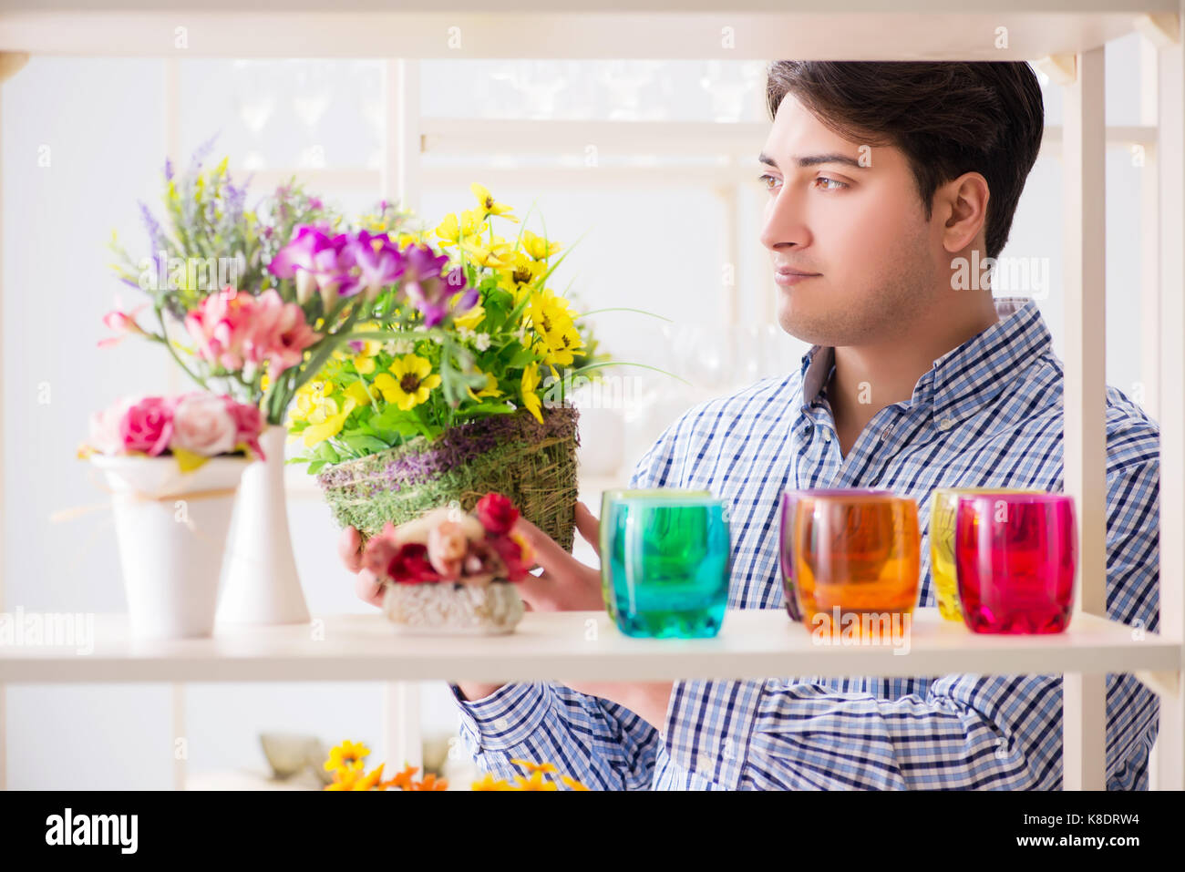 Young handsome man shopping in shop Stock Photo - Alamy