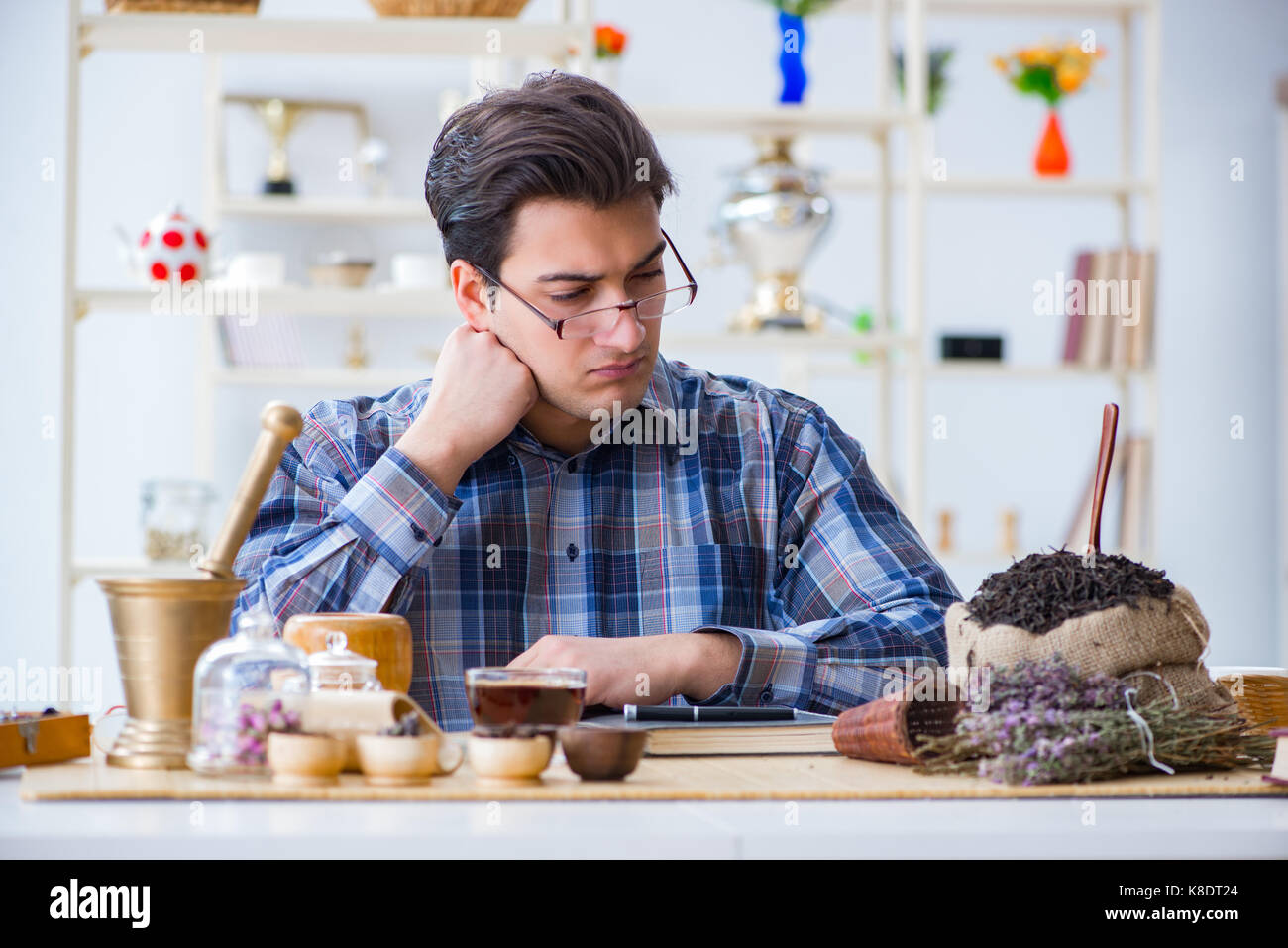 Professional tea expert trying new brews Stock Photo - Alamy