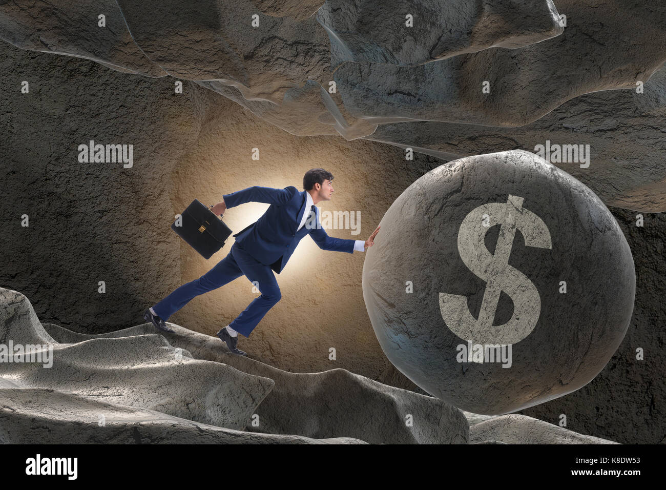 Businessman pushing dollar sign in business concept Stock Photo - Alamy