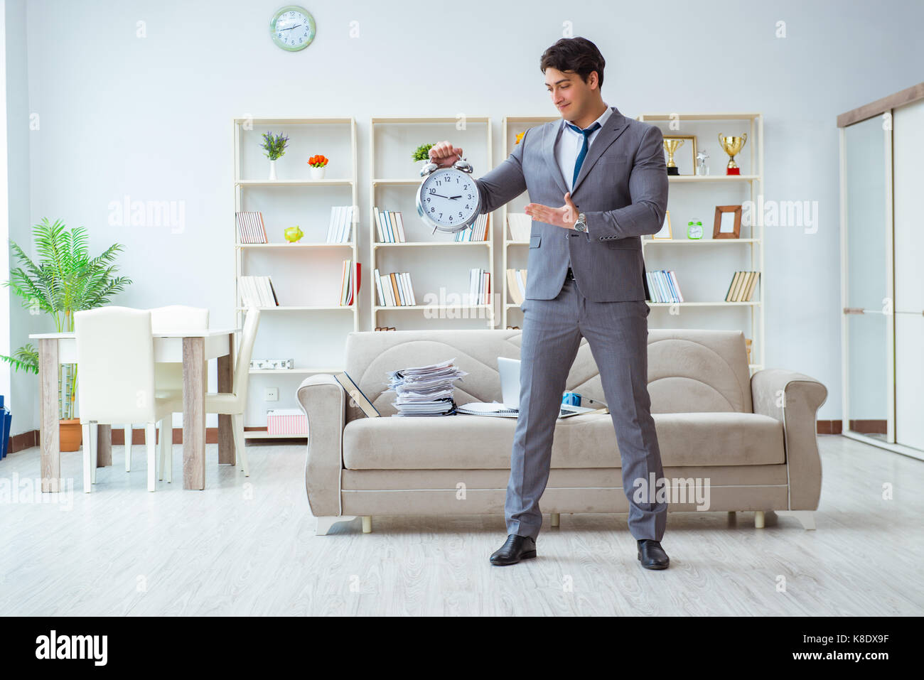 Businessman happy meeting his deadlines Stock Photo - Alamy