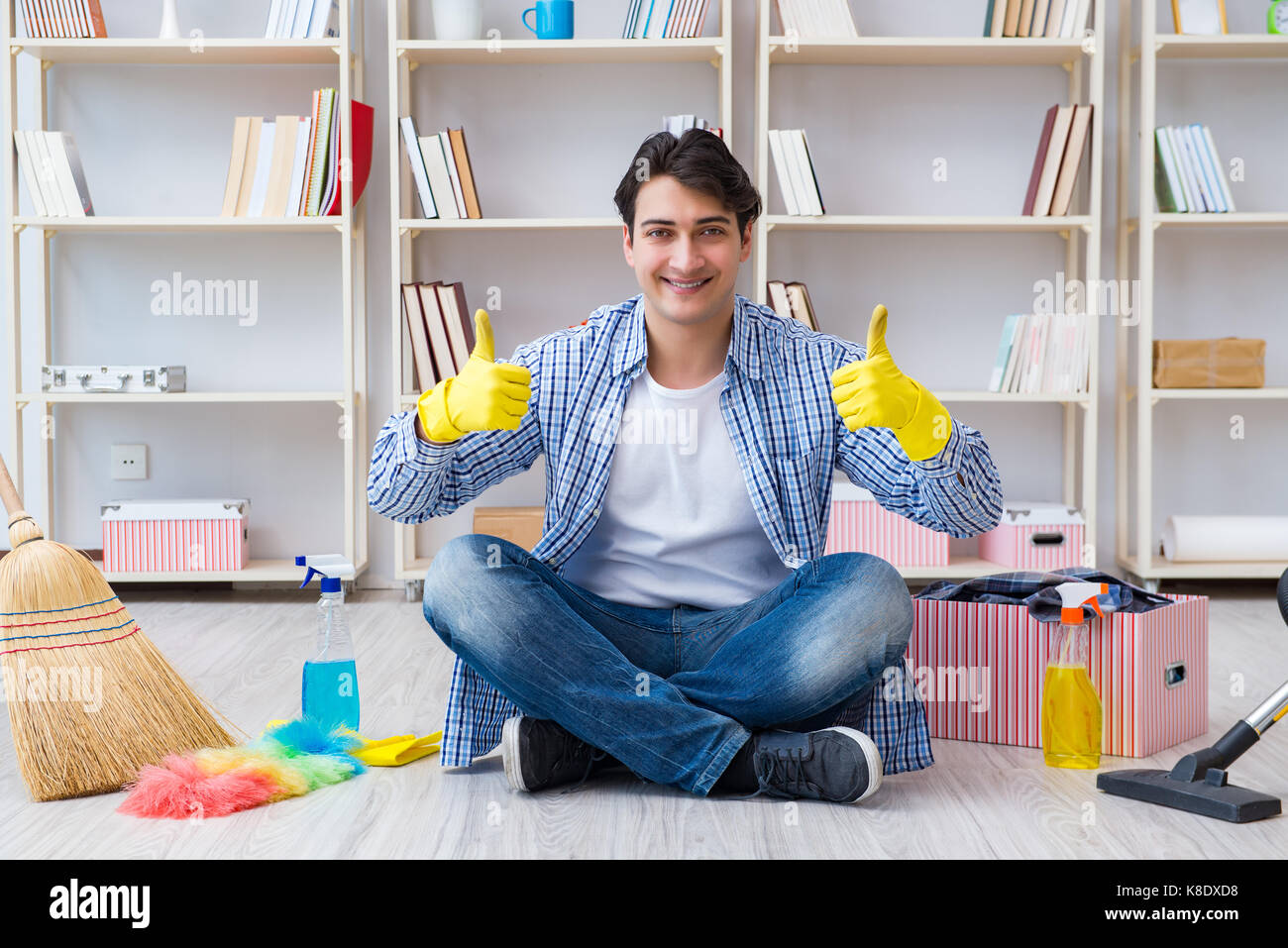Man doing cleaning at home Stock Photo - Alamy