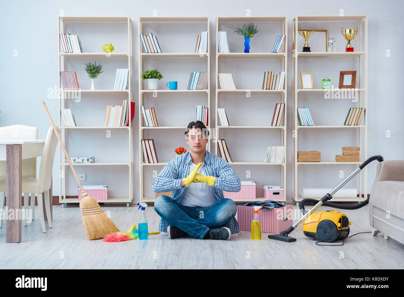 Man doing cleaning at home Stock Photo - Alamy