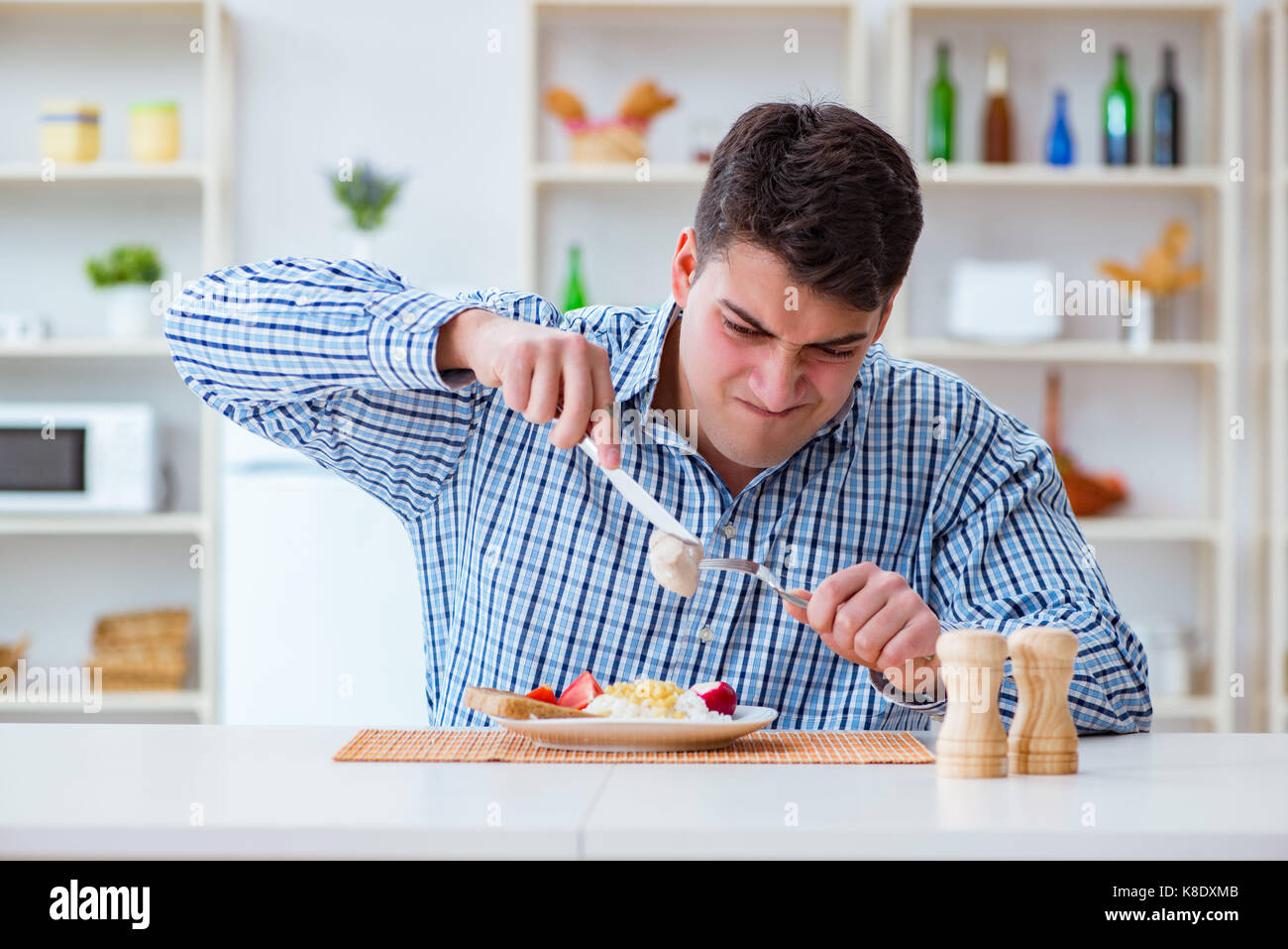 Man eating salad sad hi-res stock photography and images - Alamy