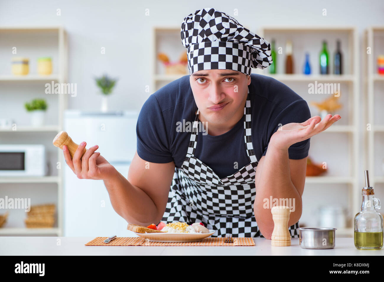 Chef cook cooking a meal breakfast dinner in the kitchen Stock Photo ...