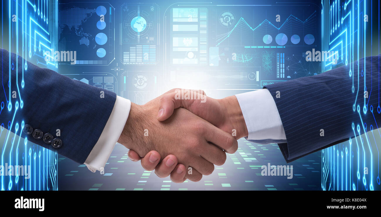 Business cooperation concept with two hands shaking Stock Photo - Alamy