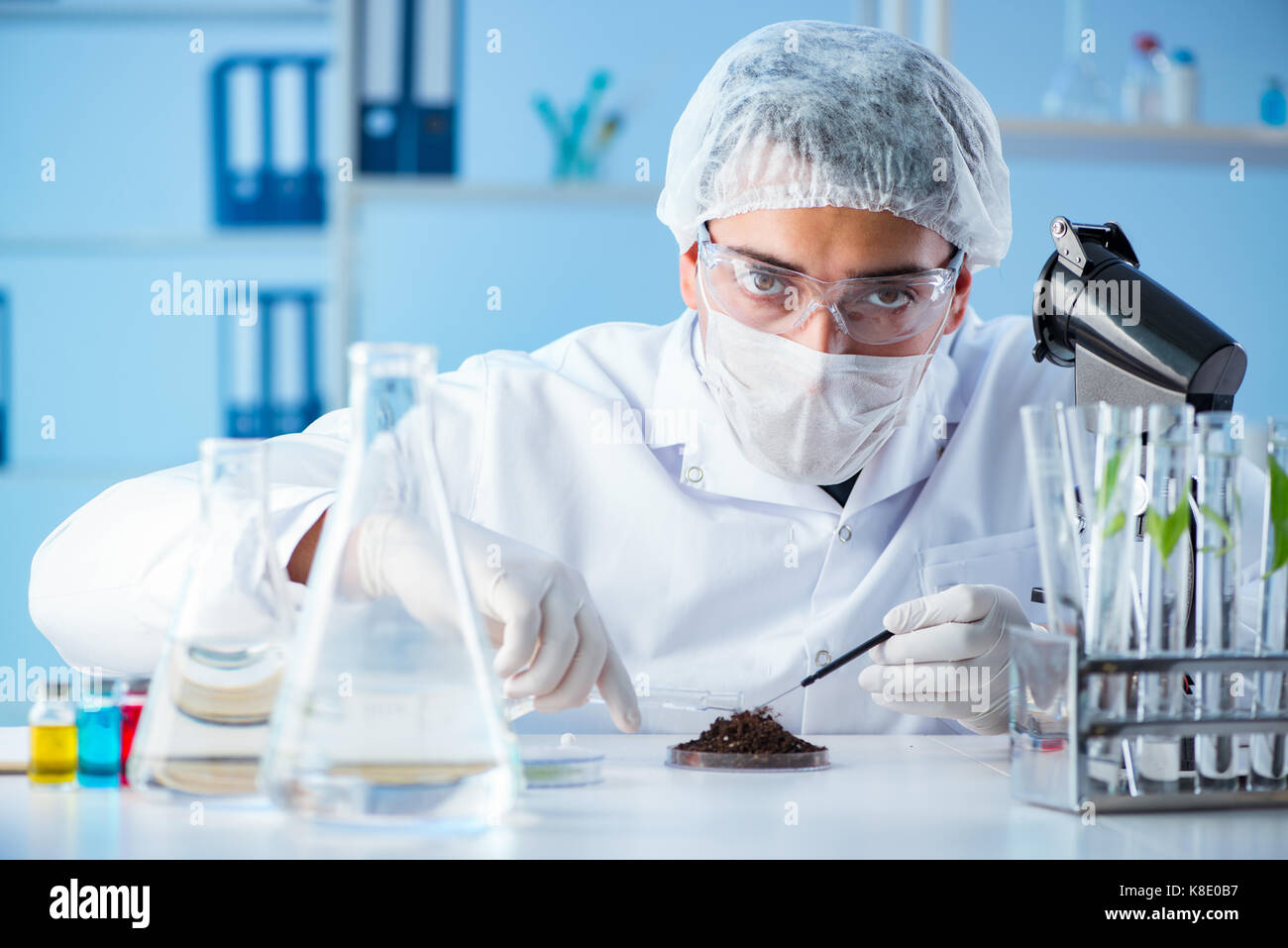 Male scientist researcher doing experiment in a laboratory Stock Photo ...