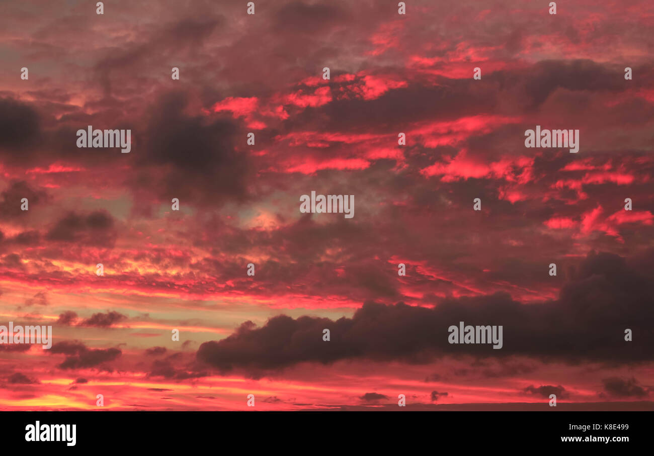 Dark red orange sunset glow red clouds hi-res stock photography and ...