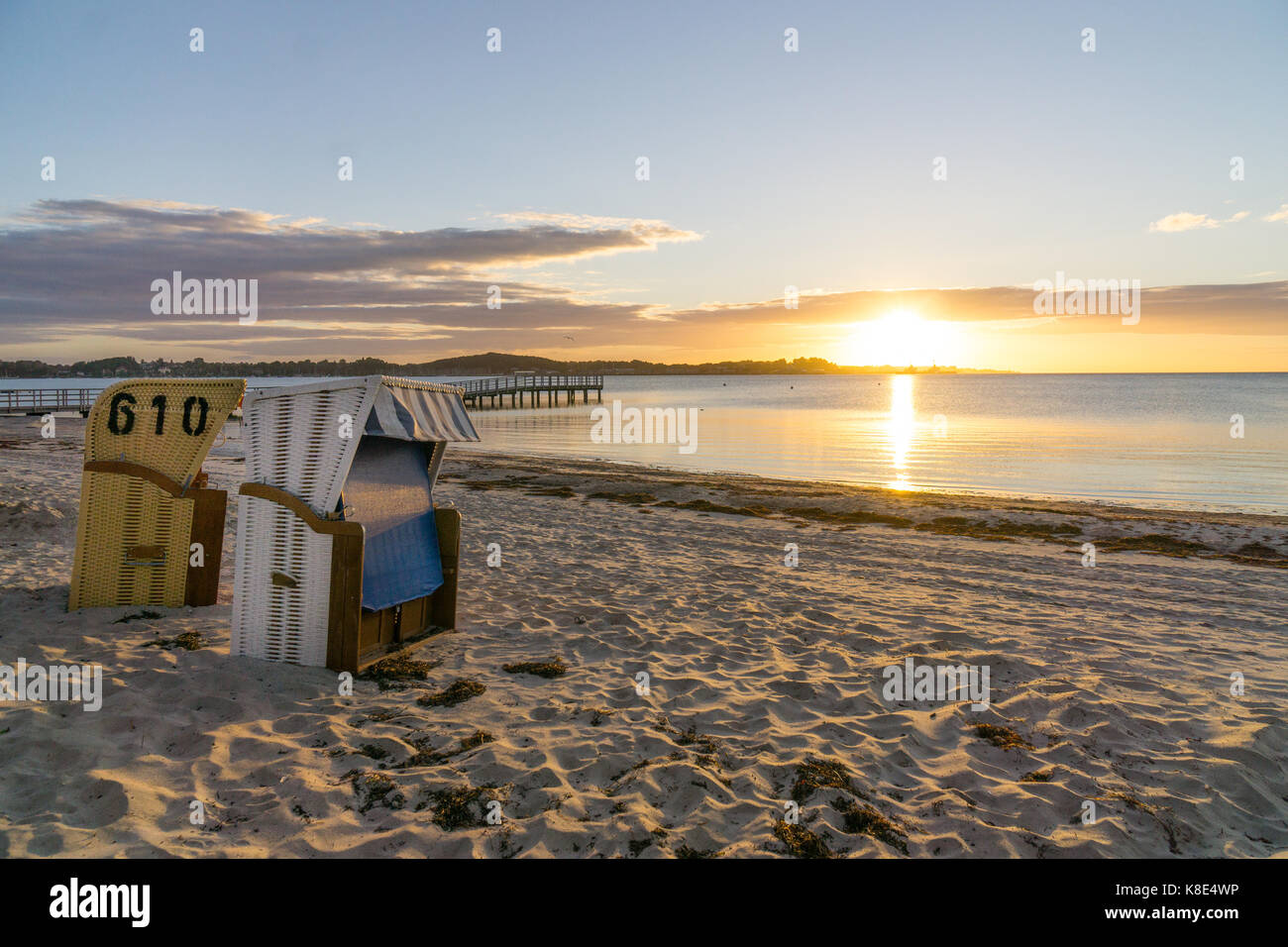European Beach wicker chairs are placed decoratively on the beach for ...