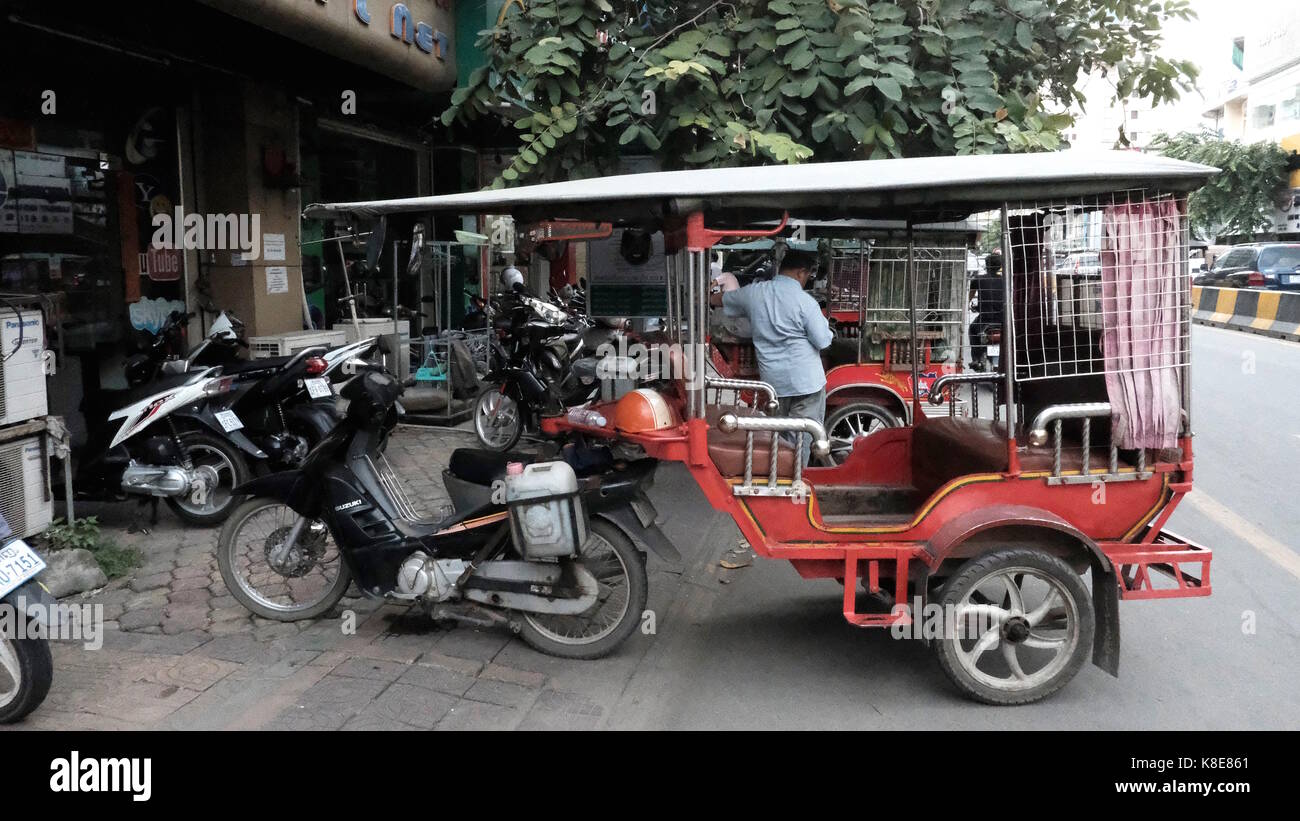 Taxi Transportation Tuk Tuks Monivong Boulevard Phnom Penh Cambodia wait for a fare Stock Photo ...