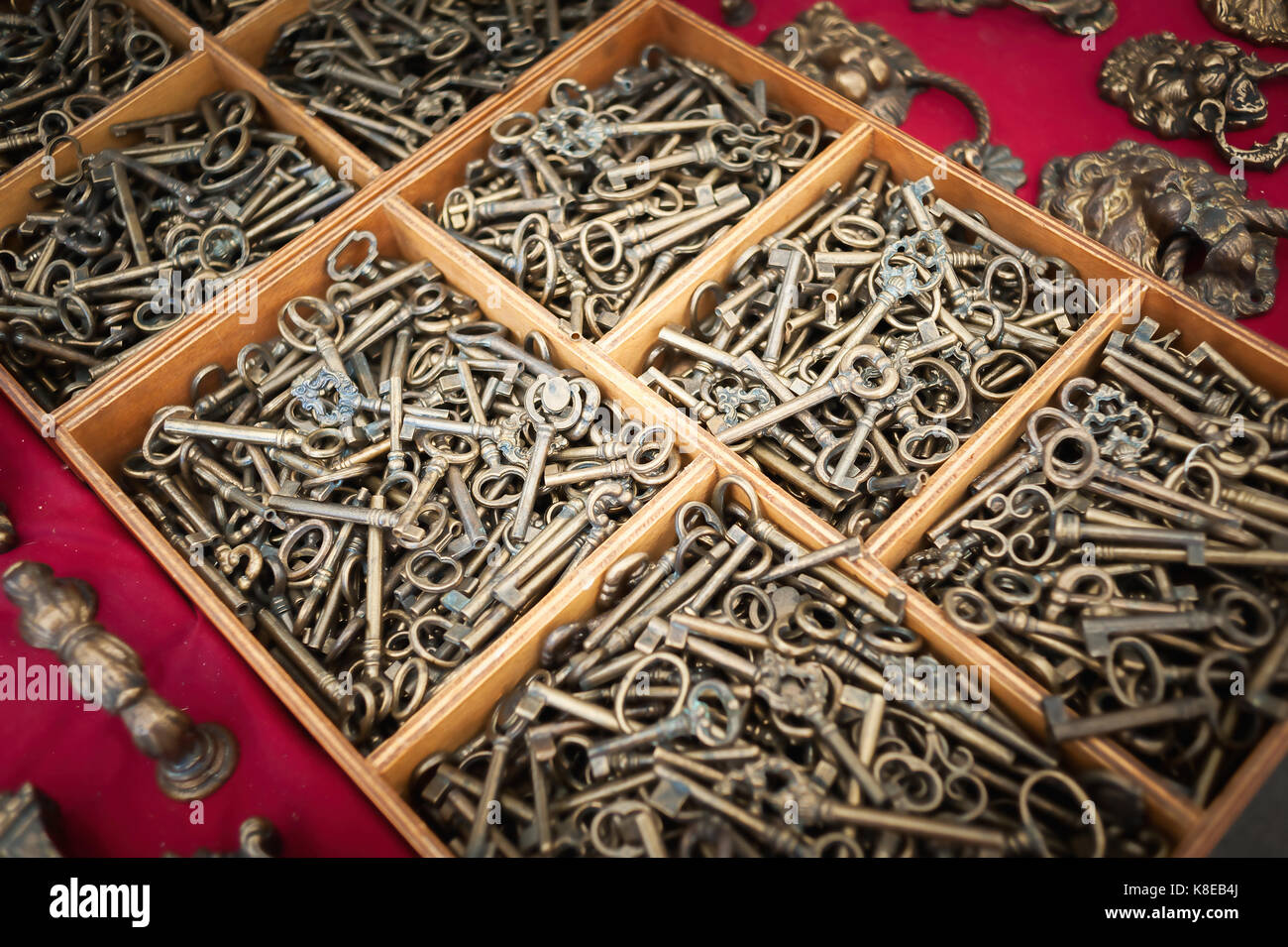 Closeup of display of old and brass reproduction keys in bulk for ...