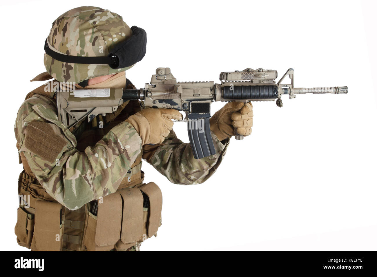 soldier with assault rifle on white background Stock Photo - Alamy