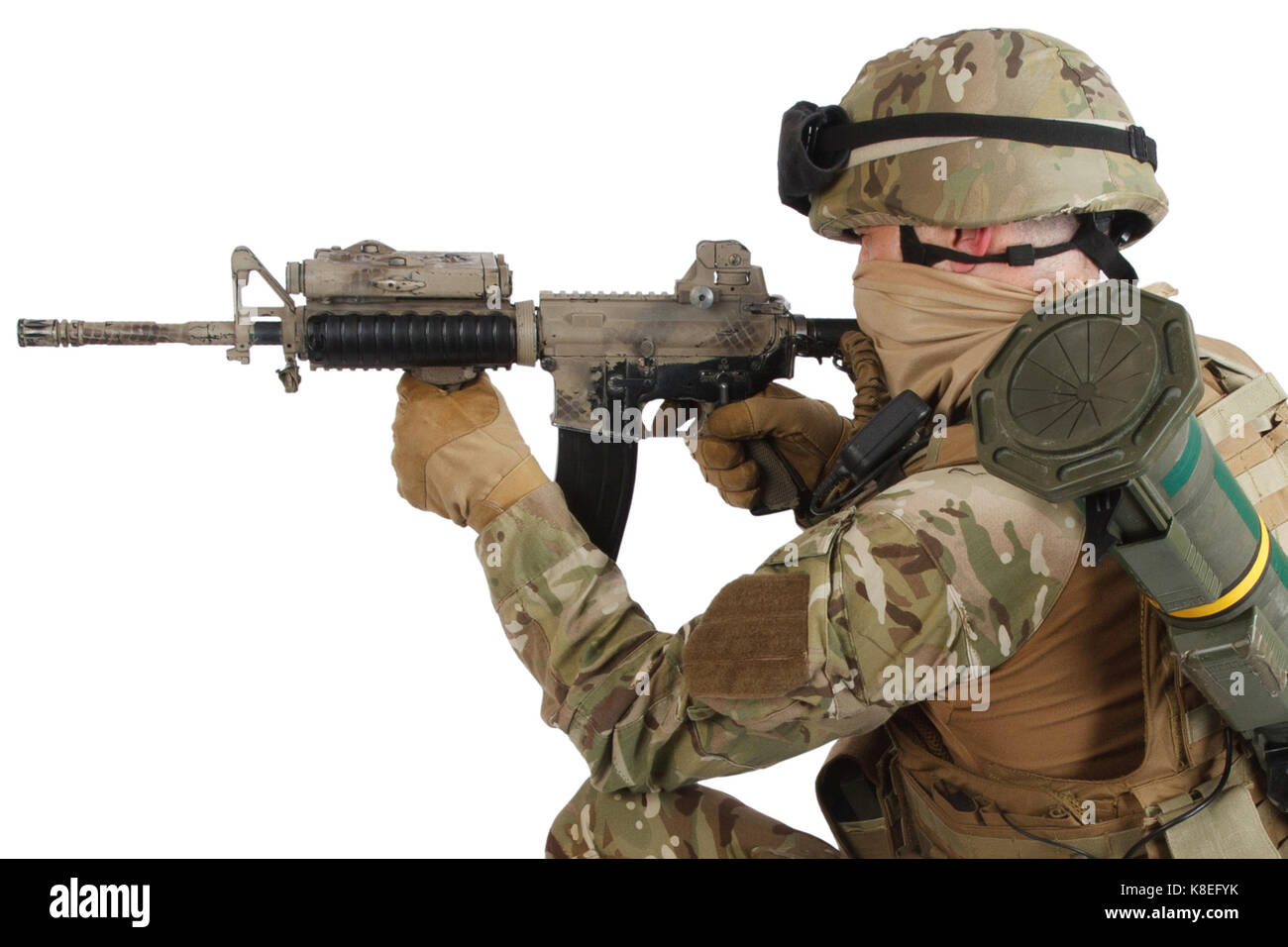 soldier with assault rifle on white background Stock Photo - Alamy