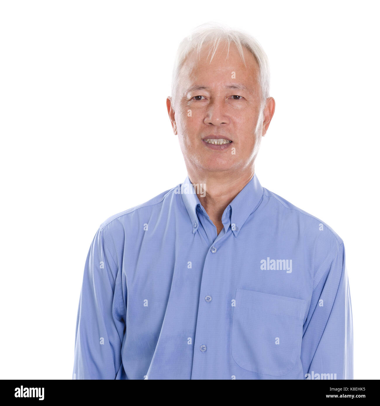 Portrait of old Asian senior man smiling, standing isolated on white ...